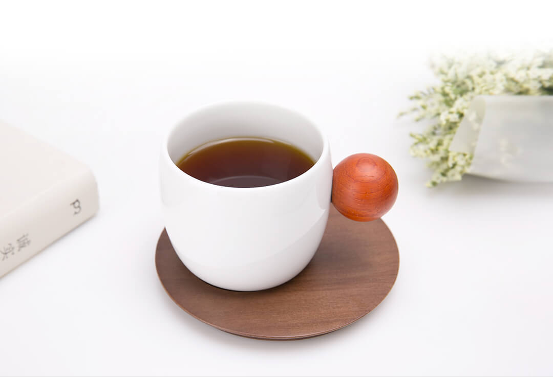 The Planet Cup is A Cute Little Teacup With A Wooden Handle - Gizmochina