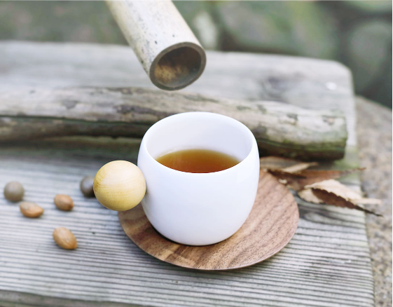 The Planet Cup is A Cute Little Teacup With A Wooden Handle - Gizmochina
