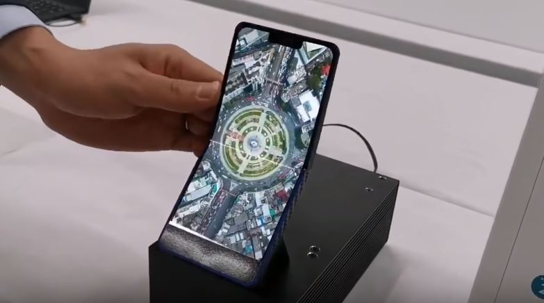 Sharp clamshell foldable prototype device appears in a video - Gizmochina