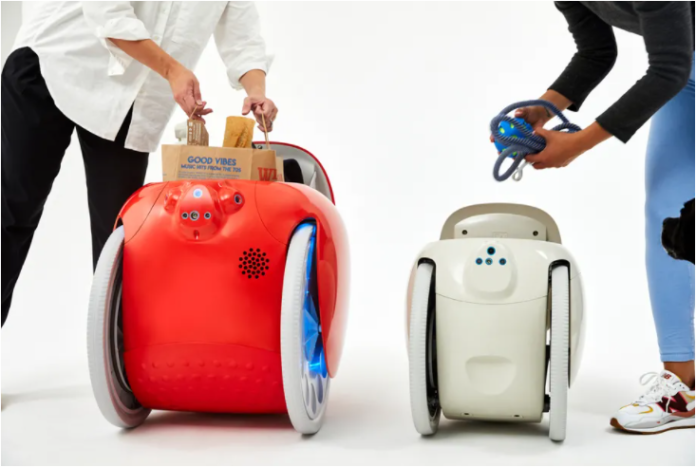 Piaggio Gitamini is a compact, cargo-carrying robot that can follow its ...