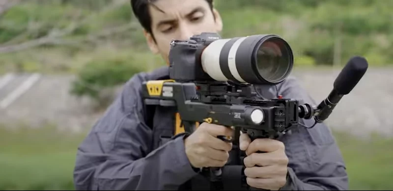 A Camera Mount that Looks like a Gun and Has a Trigger for a Shutter ...