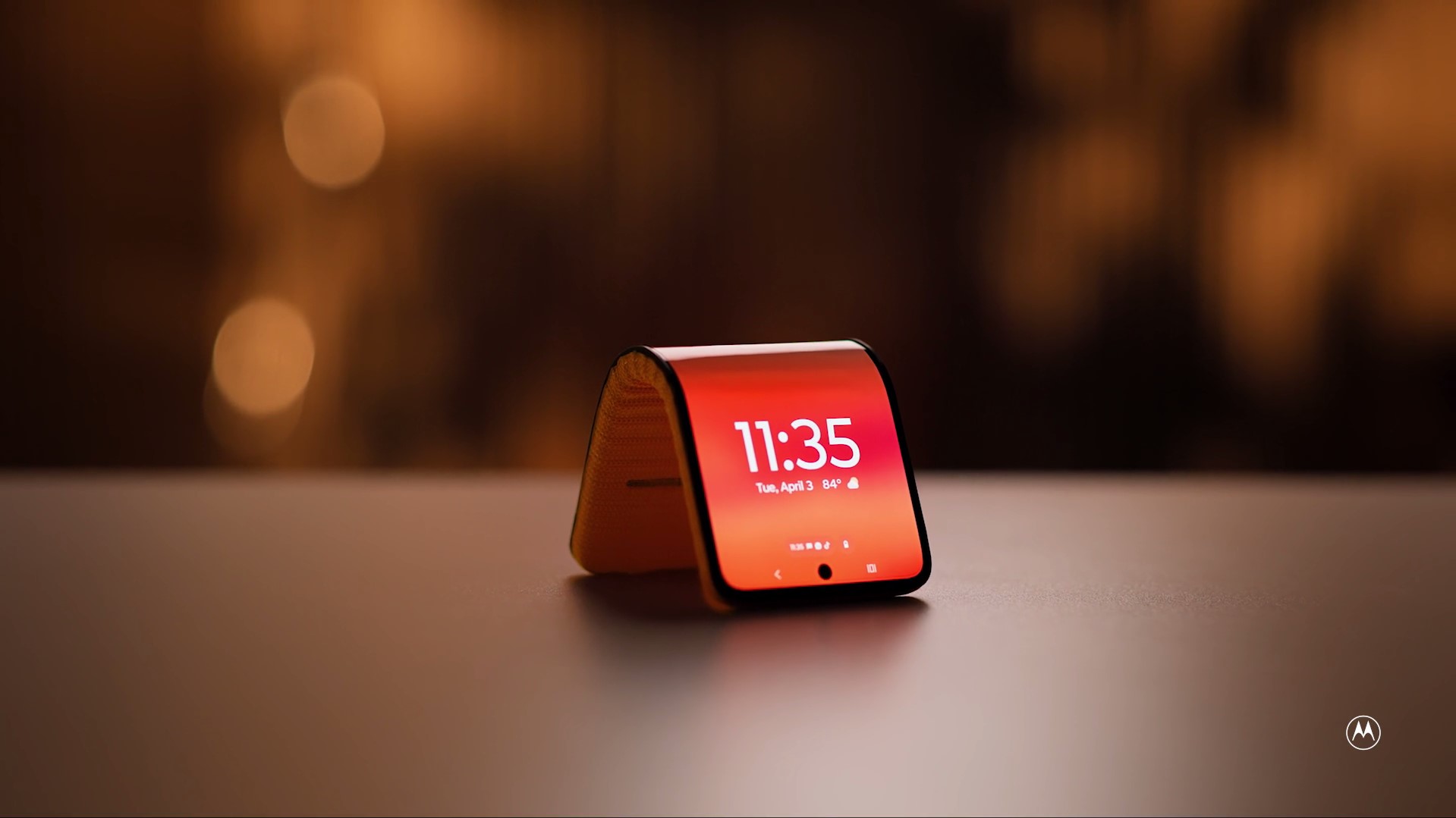 Motorola unveils a flexible smartphone concept that can wrap around ...