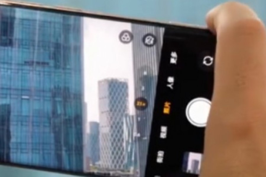 Realme follows Apple's lead with a pressure-sensitive camera button on ...