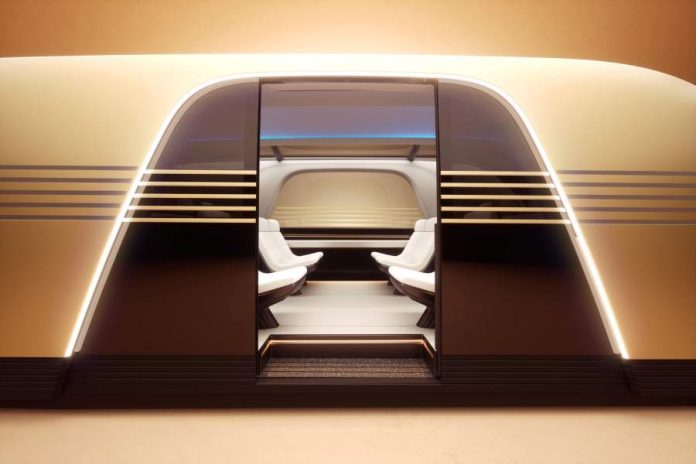 Tesla Robovan is a self-driving 20-seat passenger/cargo vehicle that's ...