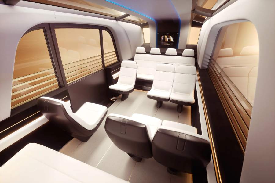 Tesla Robovan is a self-driving 20-seat passenger/cargo vehicle that's ...