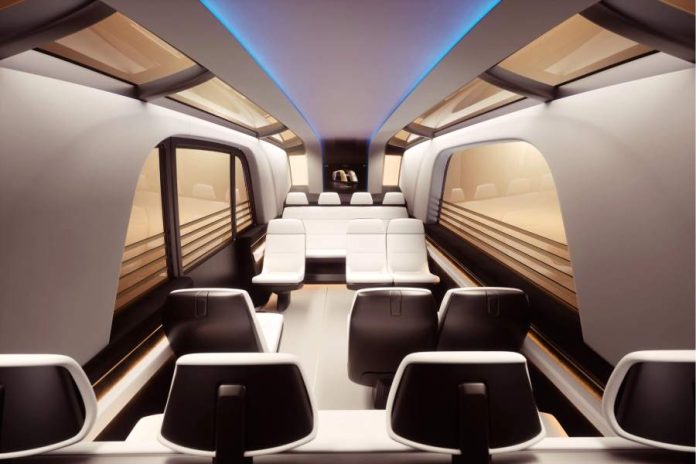 Tesla Robovan is a self-driving 20-seat passenger/cargo vehicle that's ...